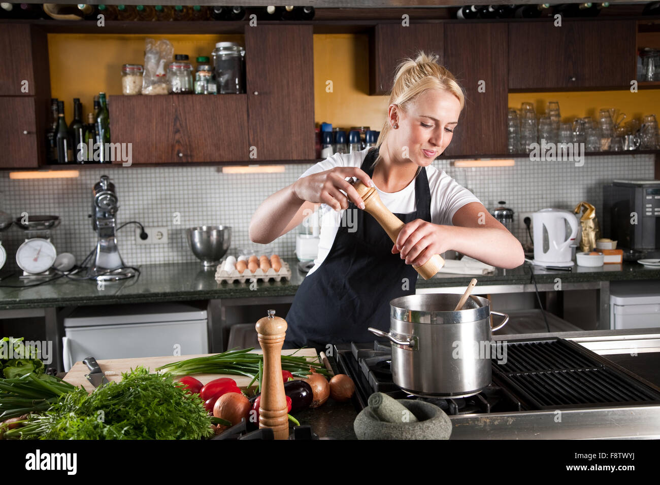 Adding some pepper Stock Photo - Alamy