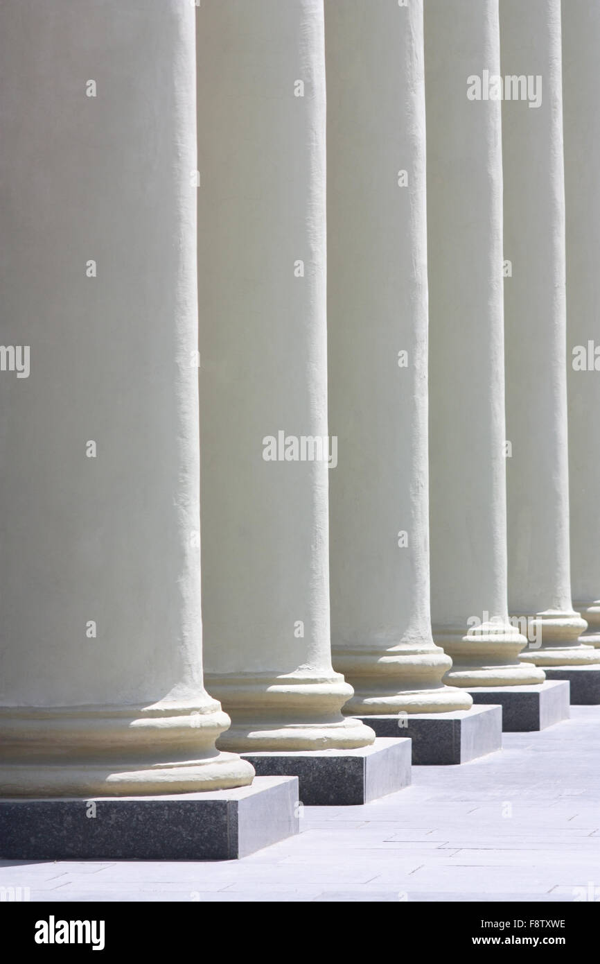 Colonnade. Several columns of sunlit perspective Stock Photo - Alamy