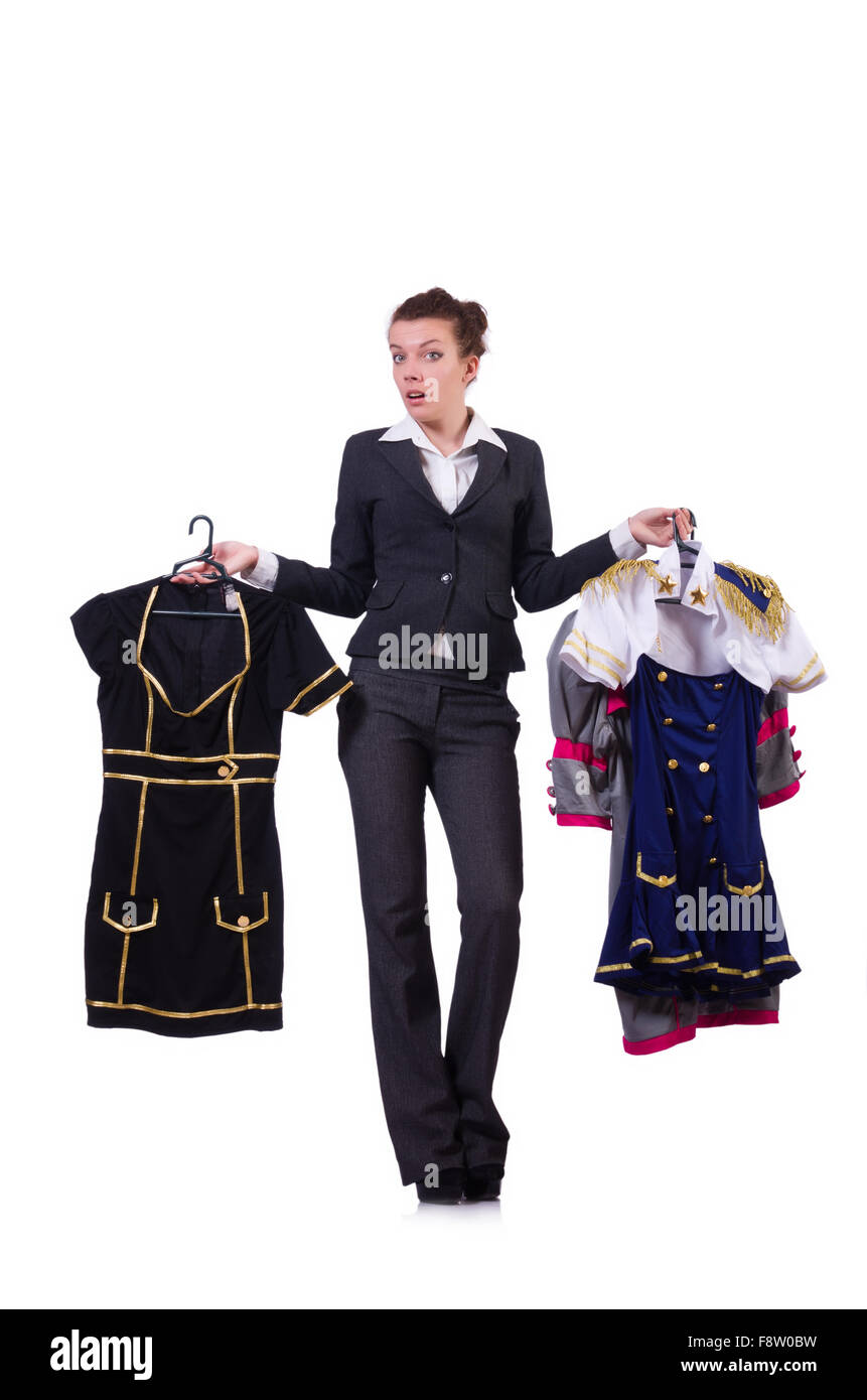 Woman trying to choose dress on white Stock Photo - Alamy