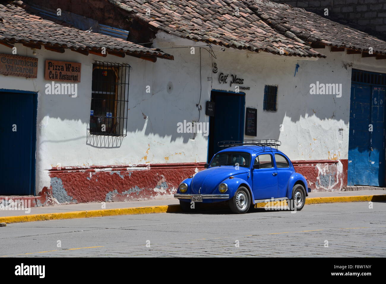 A blue VW Bug parked on the streets of Urubamba Peru Stock Photo - Alamy