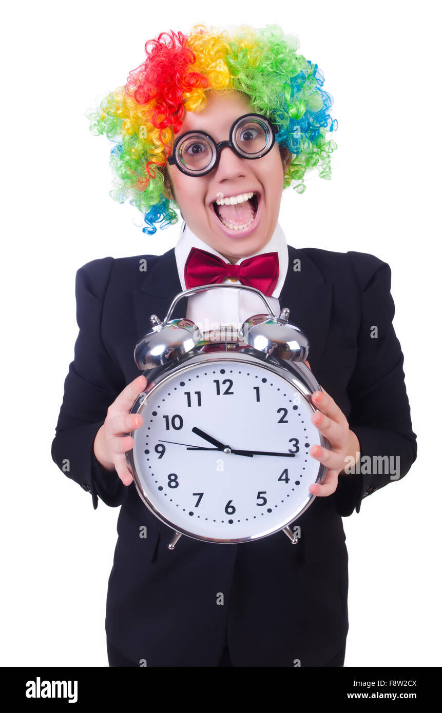 Funny clown with clock on white Stock Photo - Alamy