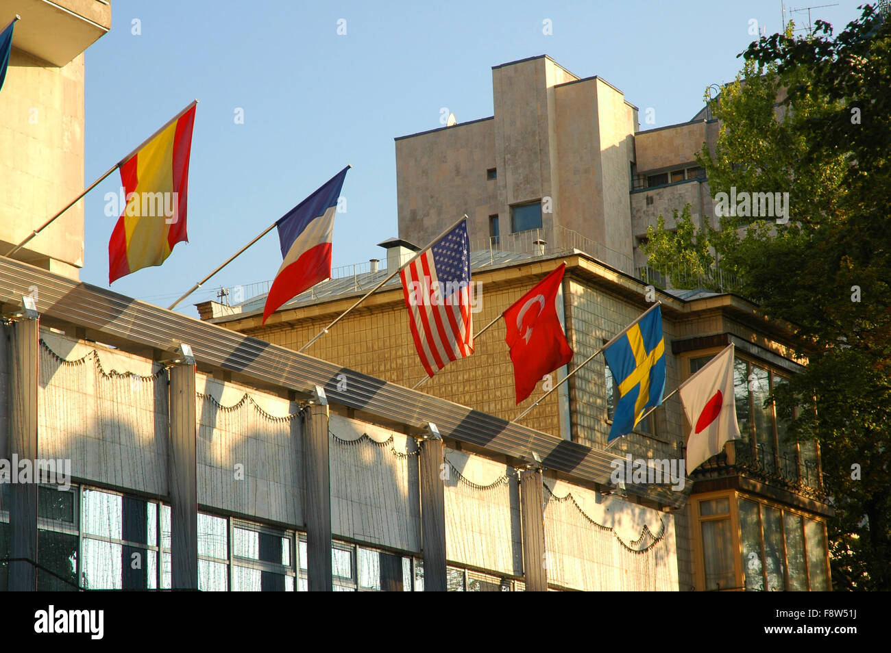 Various country flags on the building Stock Photo - Alamy