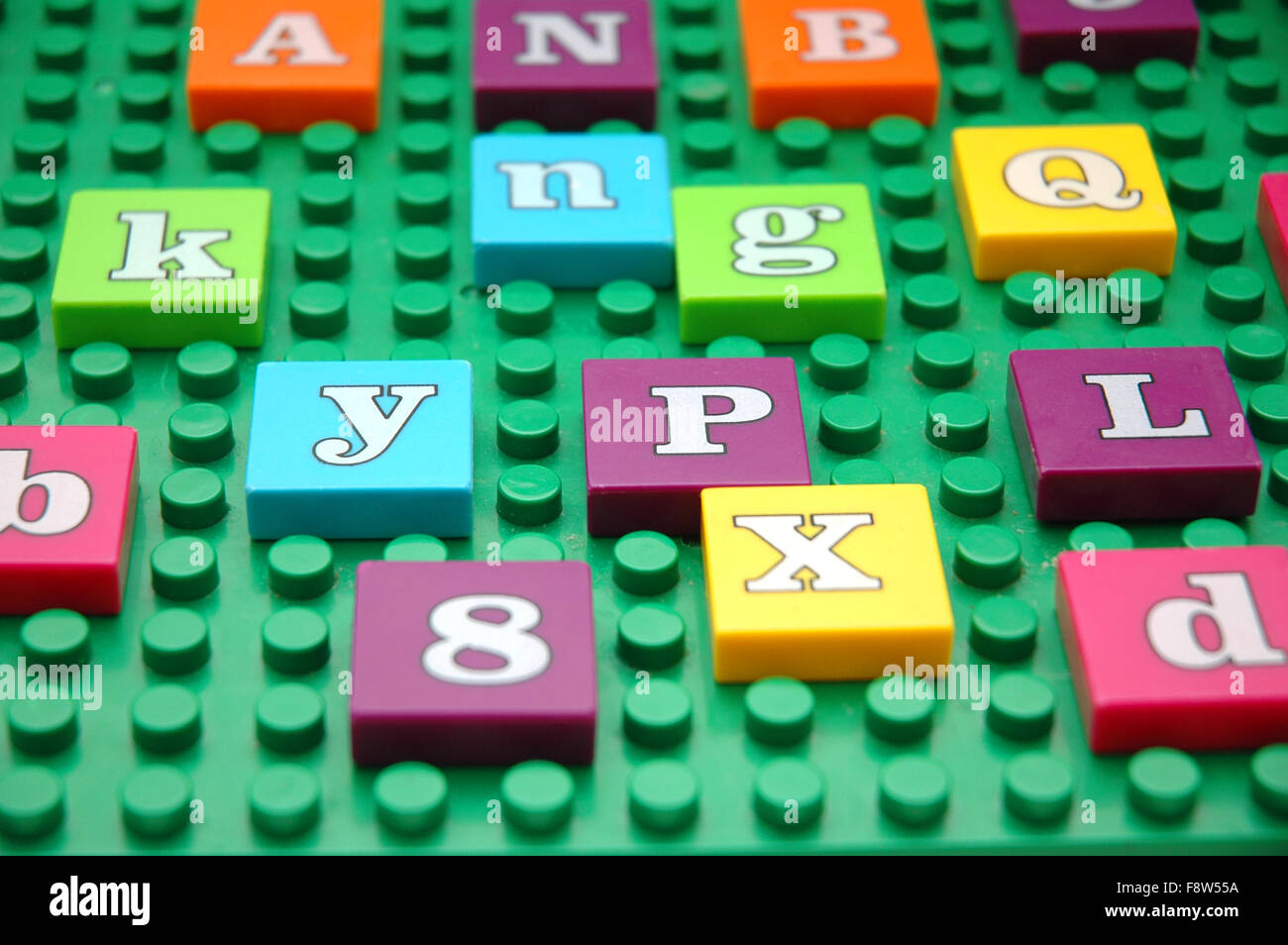 Game board with various letters Stock Photo - Alamy