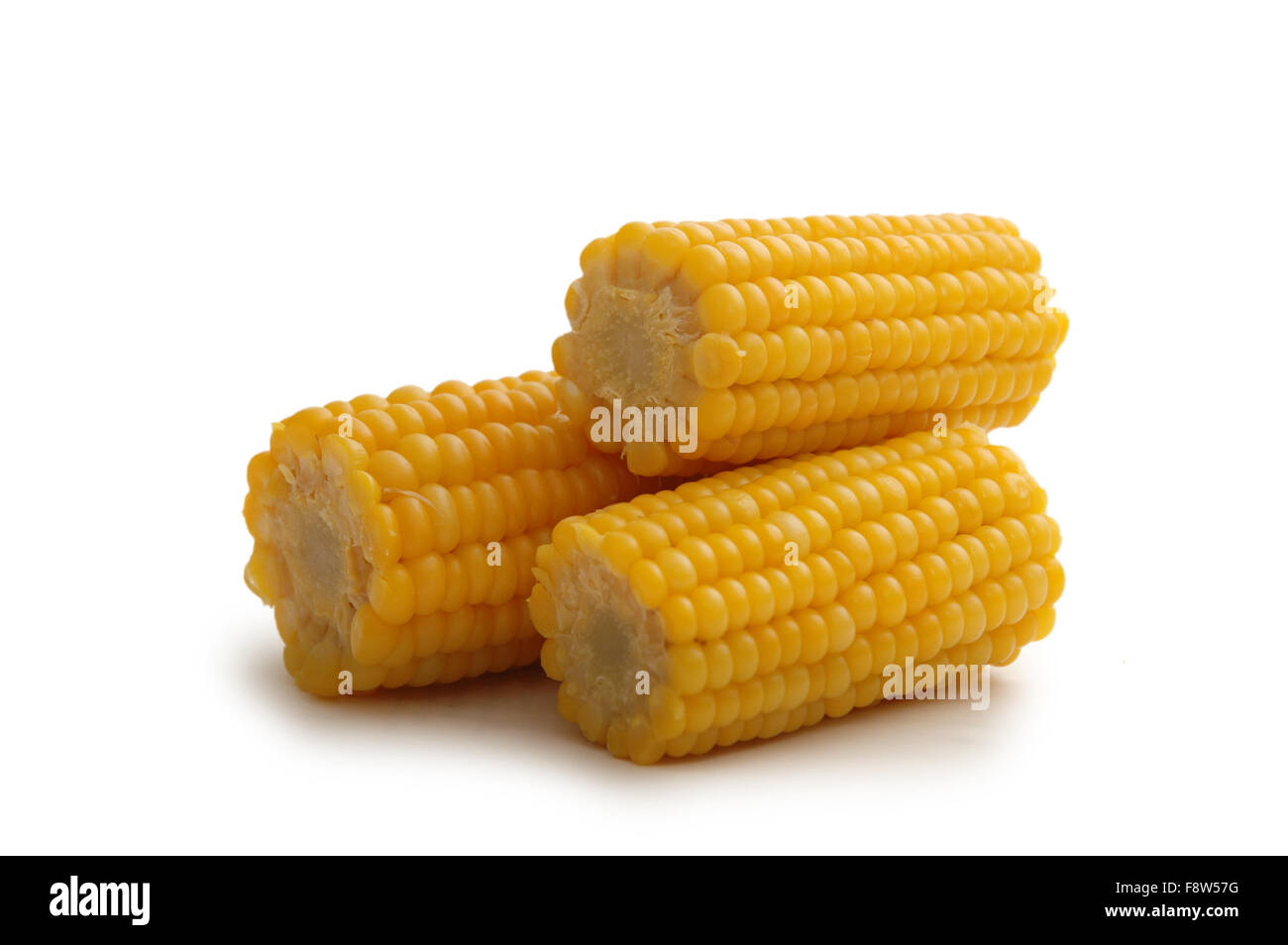 Fresh corn cobs with leaves Cut Out Stock Images & Pictures - Alamy