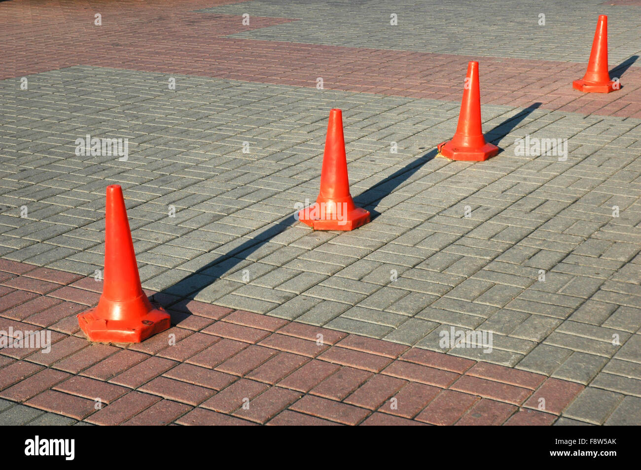 Red cones aligned in row Stock Photo - Alamy