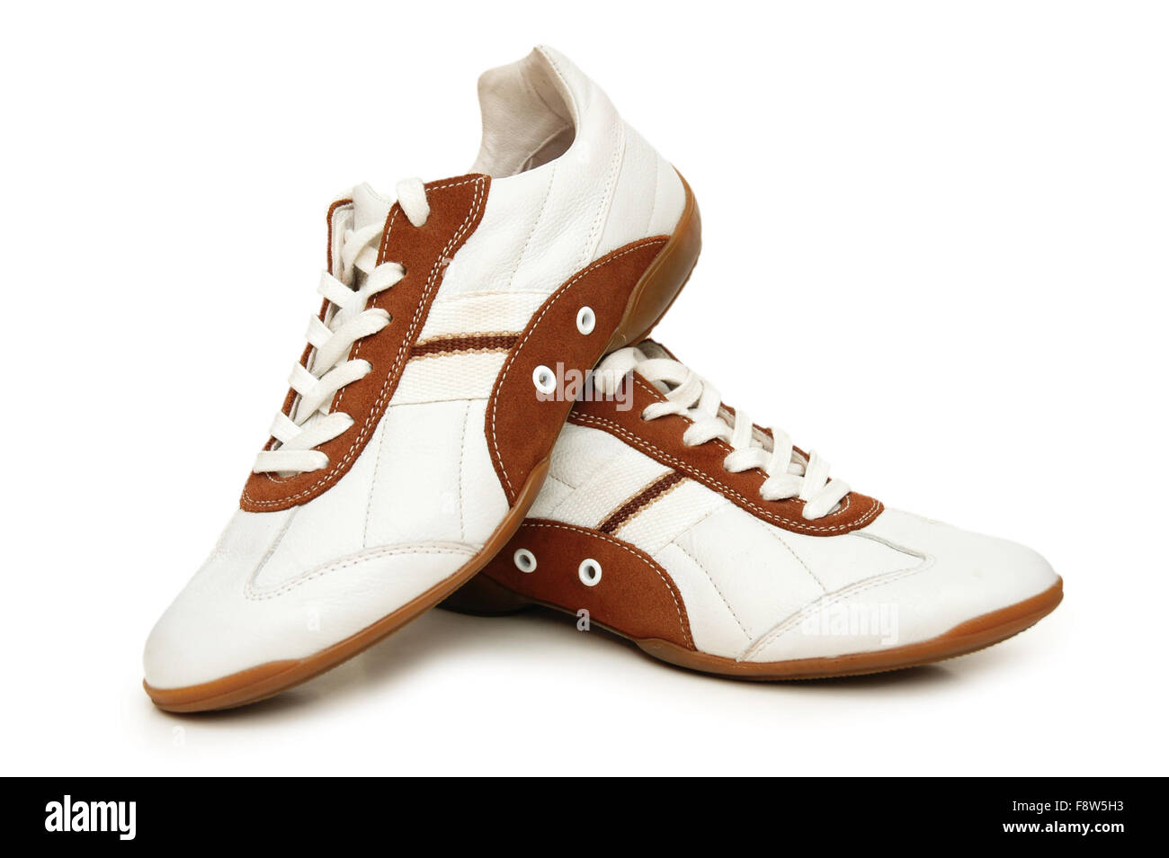 Pair of trainers isolated on white Stock Photo - Alamy