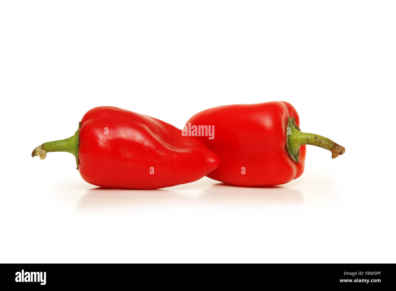 Two red peppers isolated on the white Stock Photo - Alamy