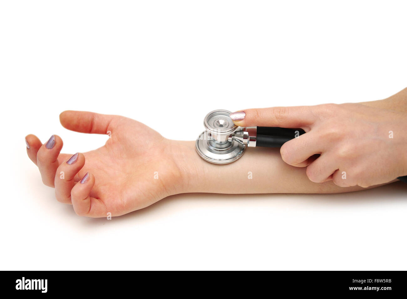 Checking the pulse with stethoscope - isolated on white Stock Photo - Alamy