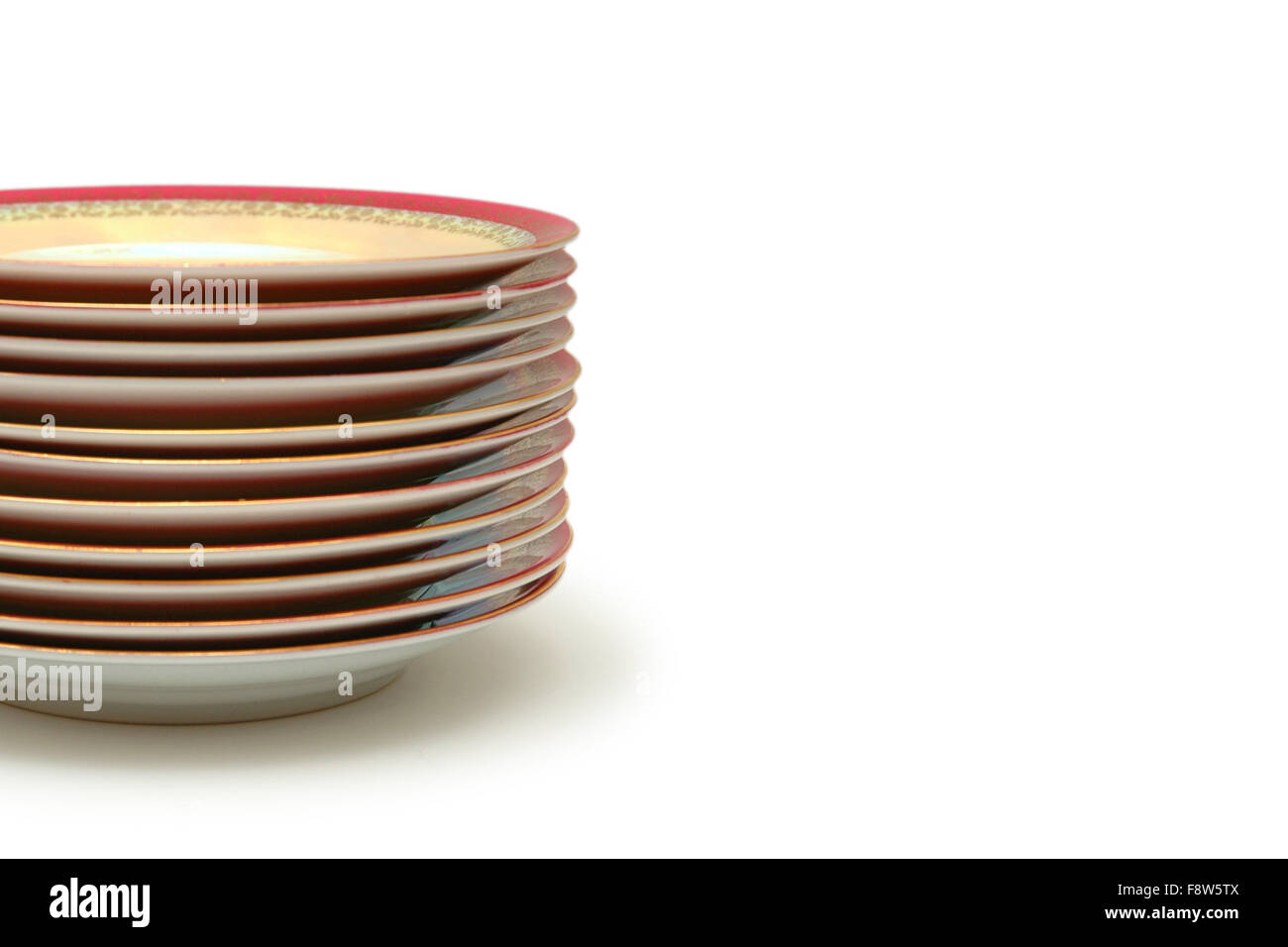 Stacked plates isolated on white - space for your text Stock Photo - Alamy