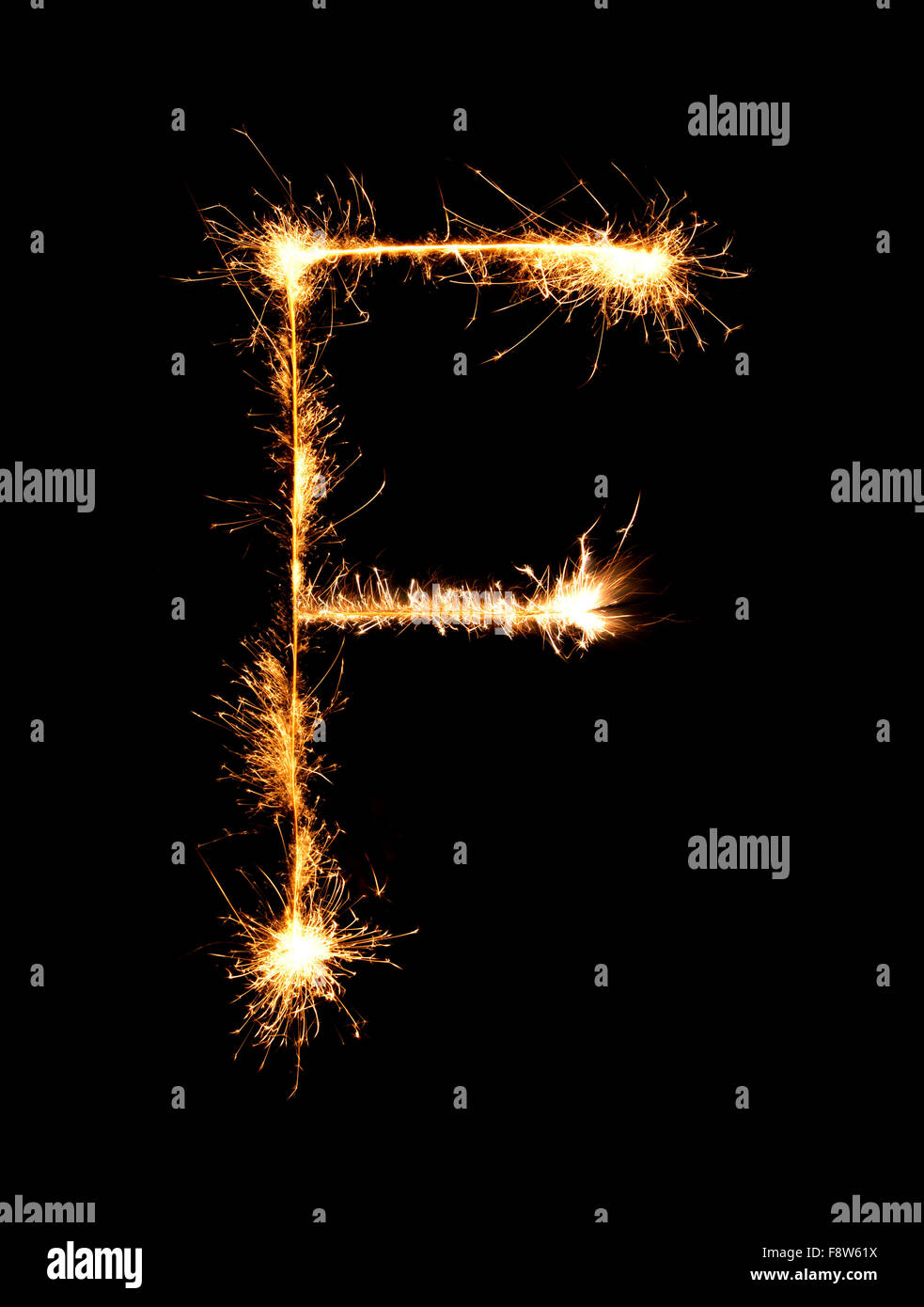 Sparkler firework light alphabet F (Capital Letters) at night ...