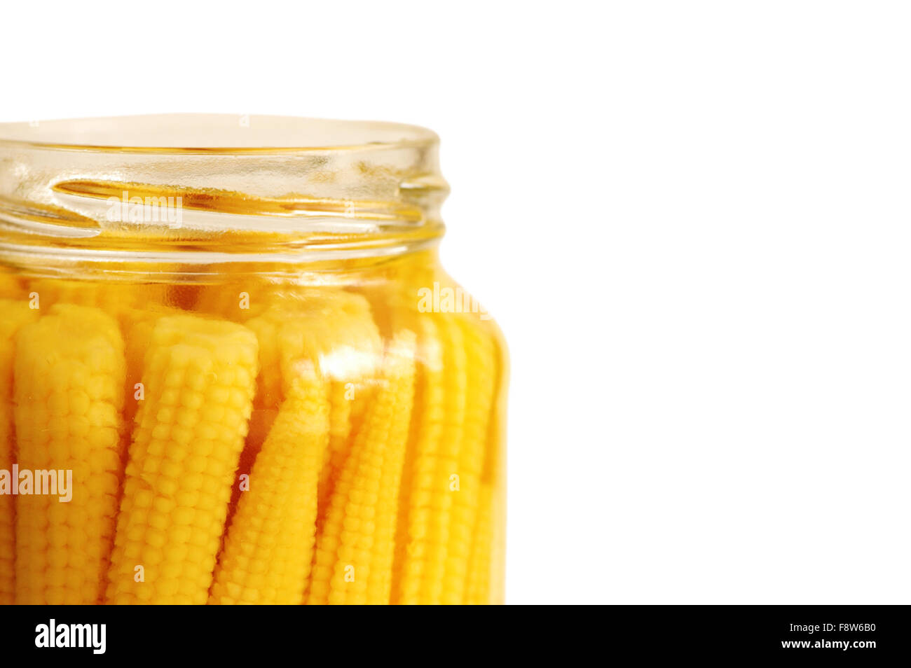 Baby corn in the jar isolated on white Stock Photo - Alamy