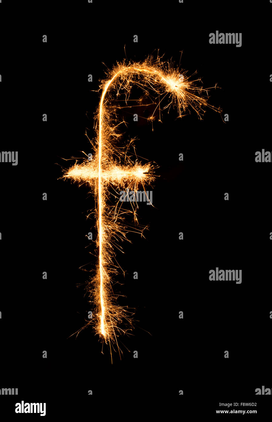 Sparkler firework light alphabet f (Small Letters) at night background ...
