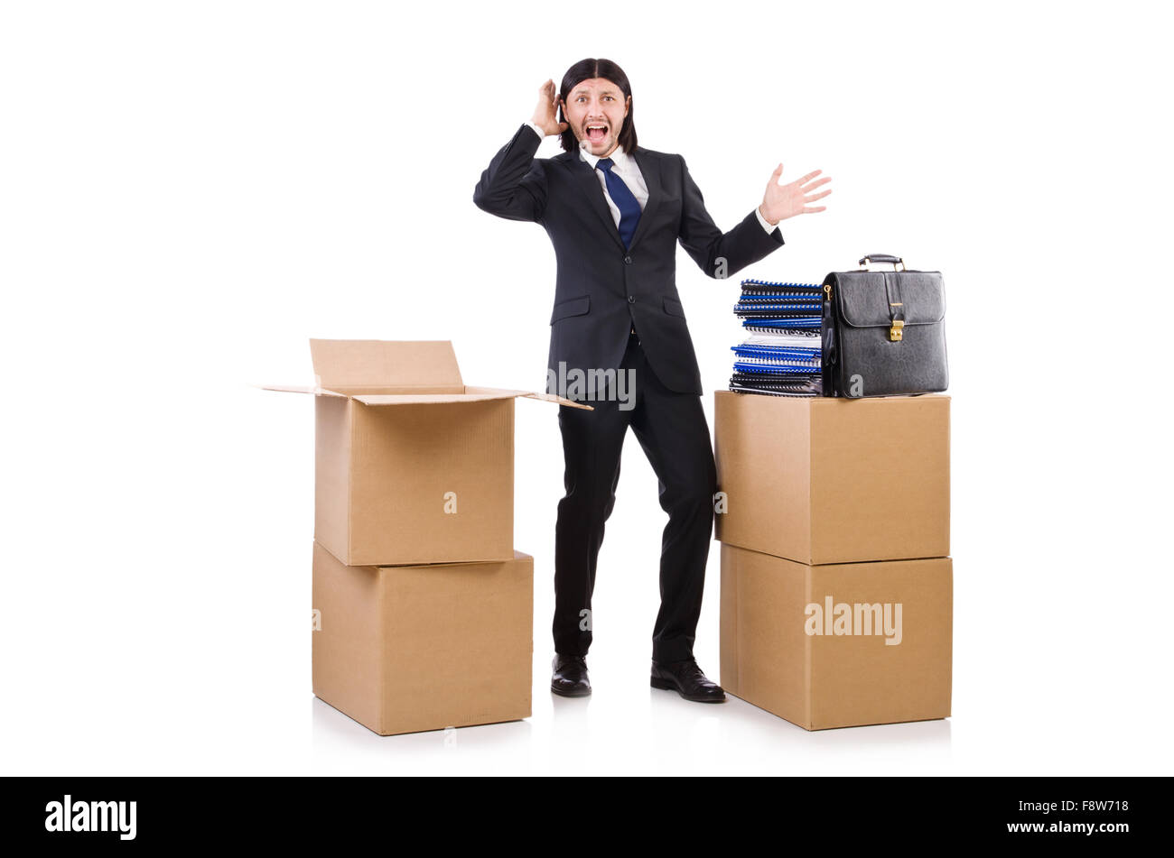Man with boxes full of work Stock Photo - Alamy
