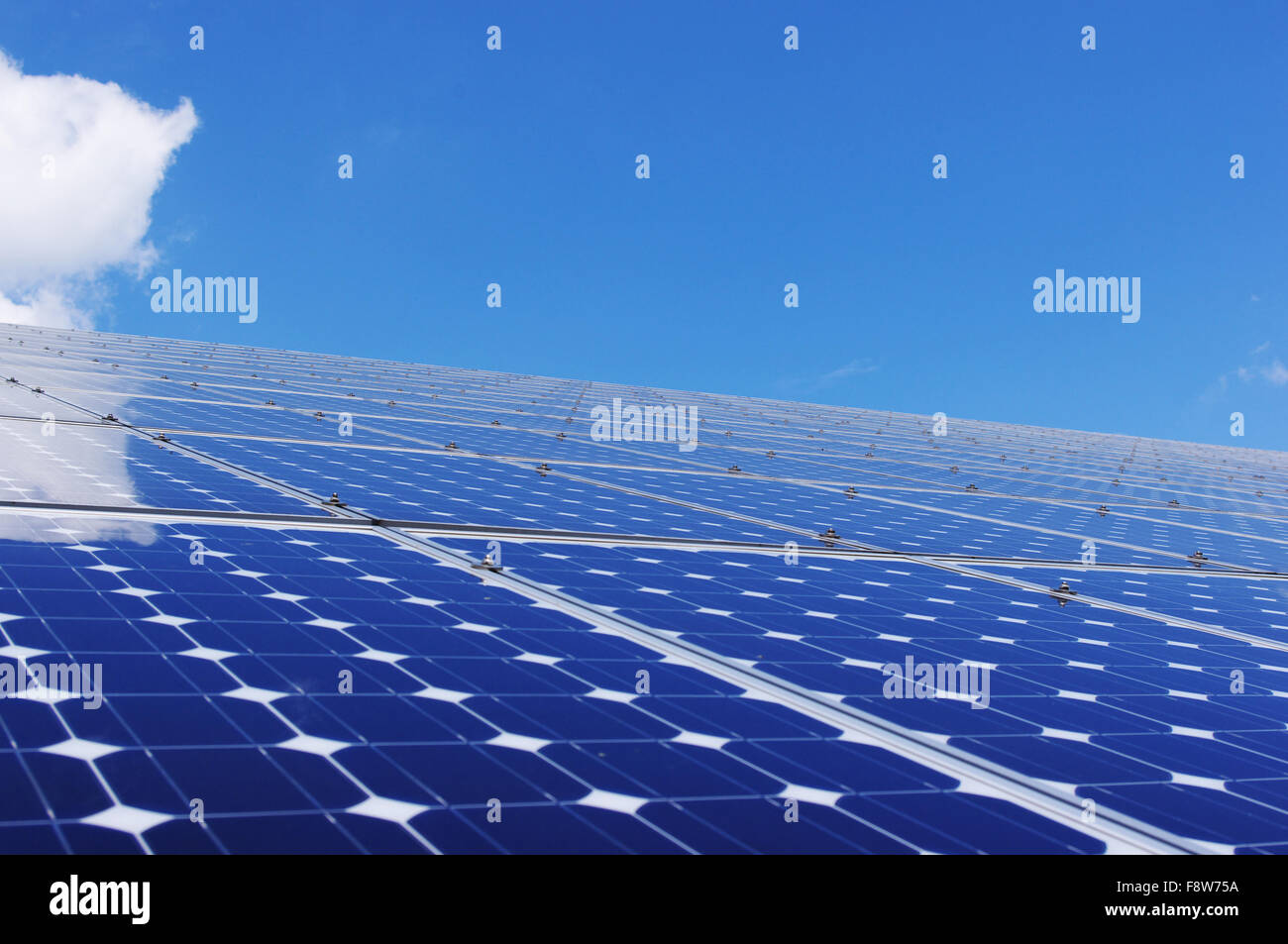 Solar panels and blue sky Stock Photo - Alamy