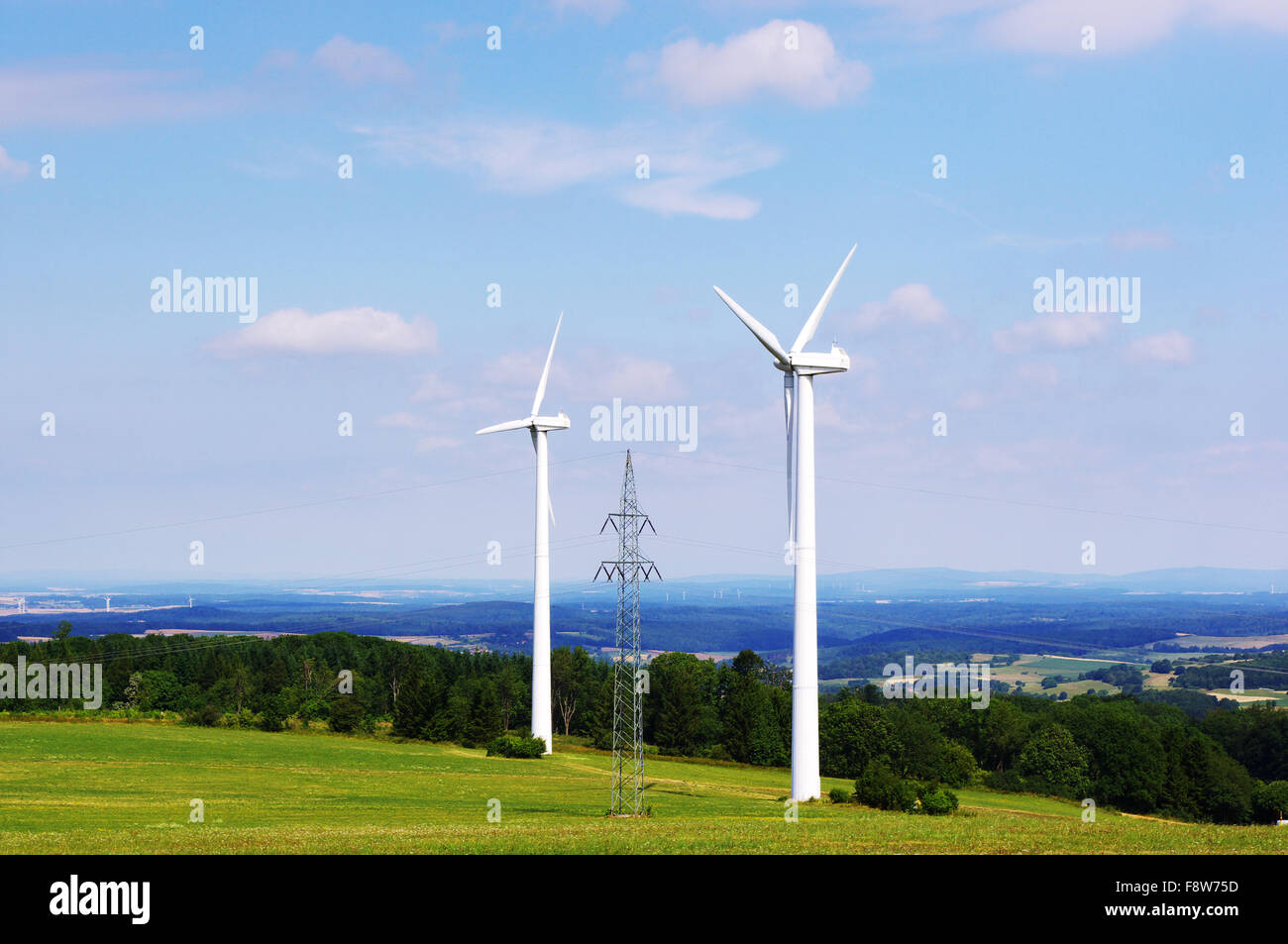 Wind turbines and pylon Stock Photo - Alamy