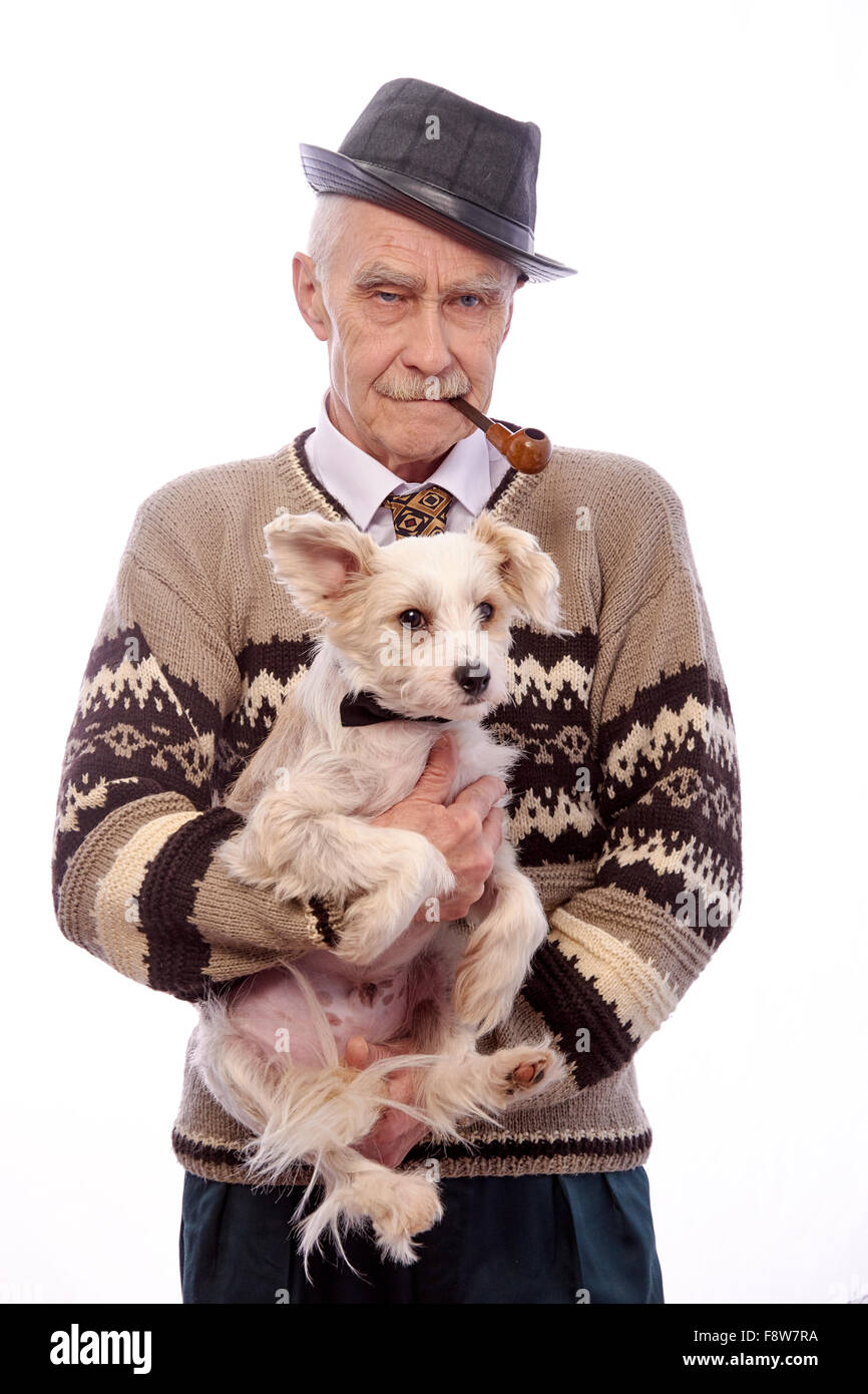Cute grandpa with a dog sitting on his hands Stock Photo - Alamy