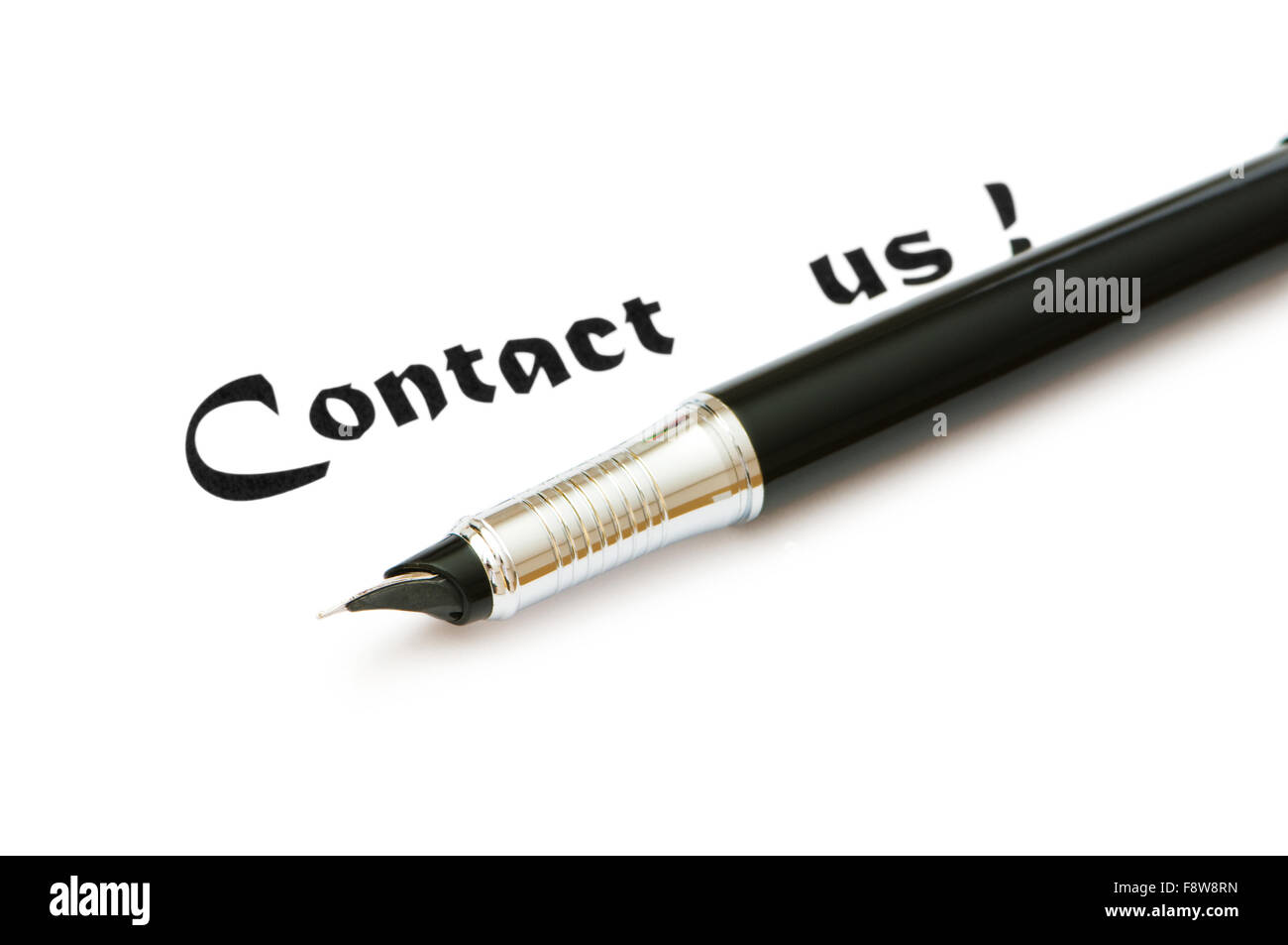 Pen and contact us message on white Stock Photo - Alamy