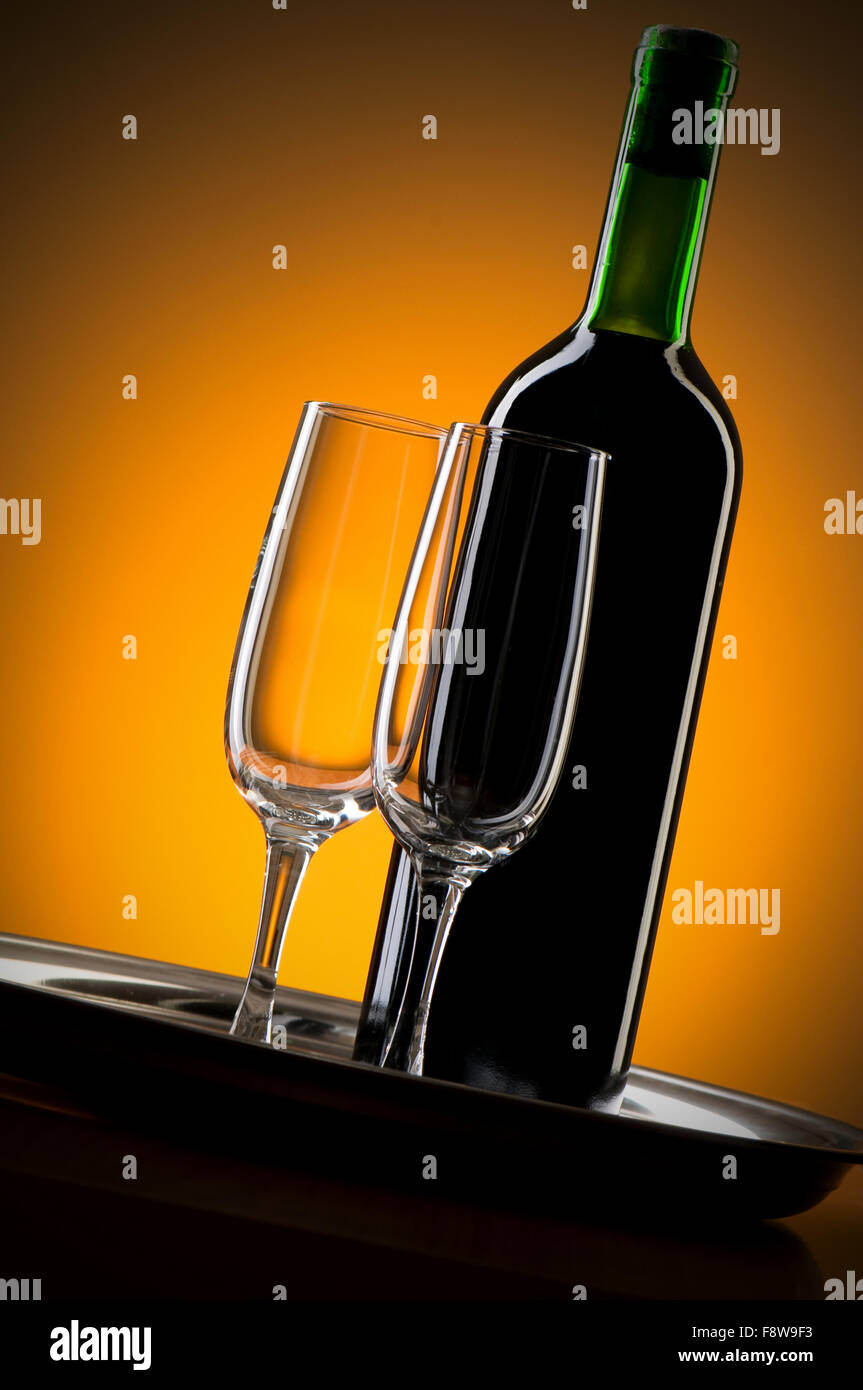 Wine against colour gradient background Stock Photo - Alamy