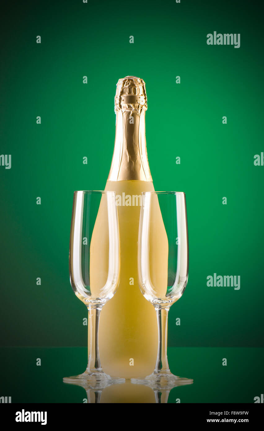 Champagne against color gradient background Stock Photo - Alamy