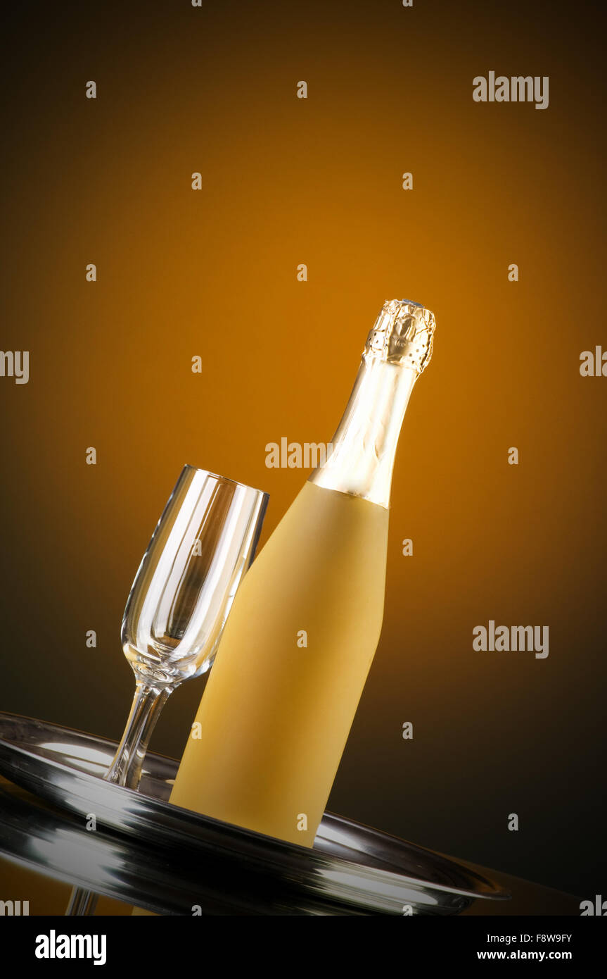 Champagne against color gradient background Stock Photo - Alamy