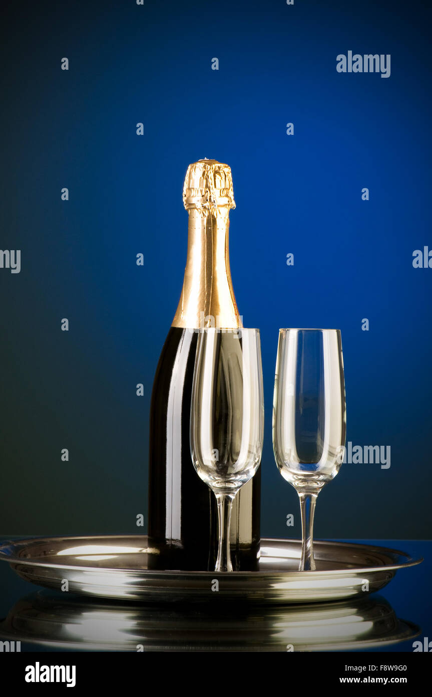 Champagne against color gradient background Stock Photo - Alamy