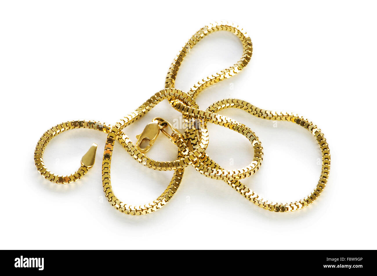 Golden chain isolated on the white background Stock Photo - Alamy