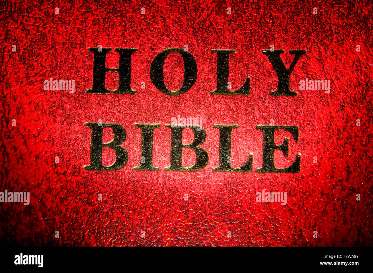 Red leather cover of the Bible book Stock Photo - Alamy