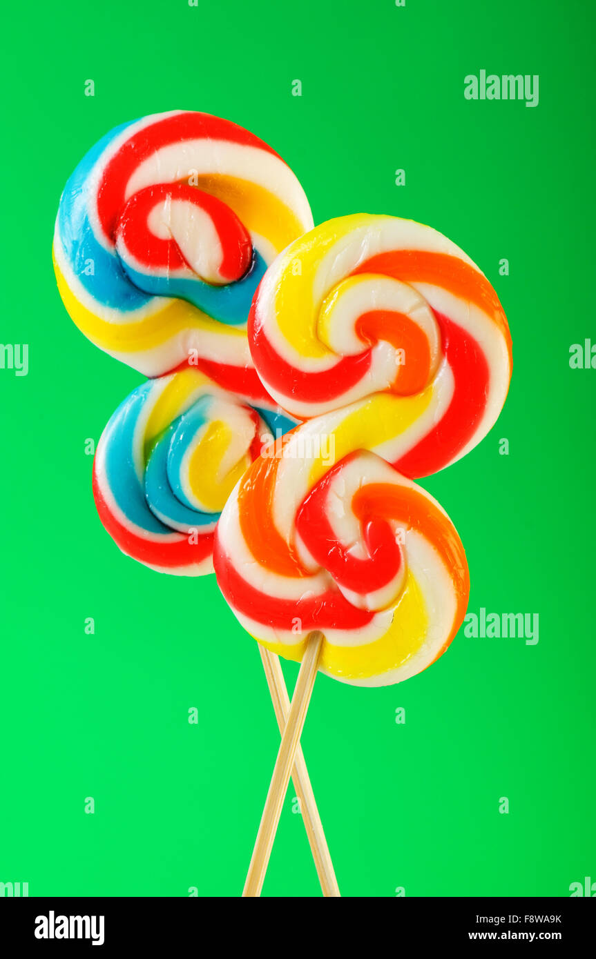 Colourful lollipop against the colourful background Stock Photo - Alamy