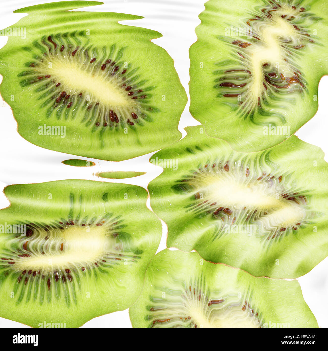 Group of cross a kiwi-fruits under water Stock Photo - Alamy