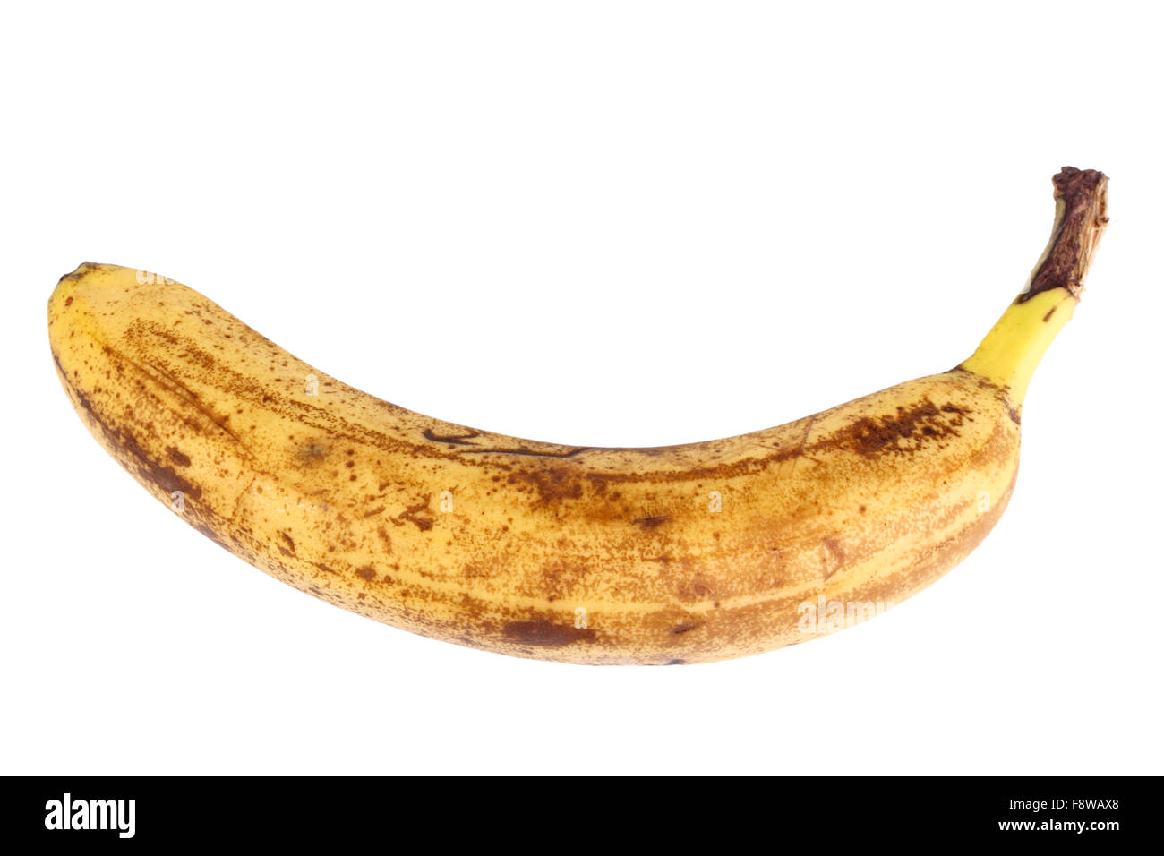 Single old yellow banana Stock Photo - Alamy