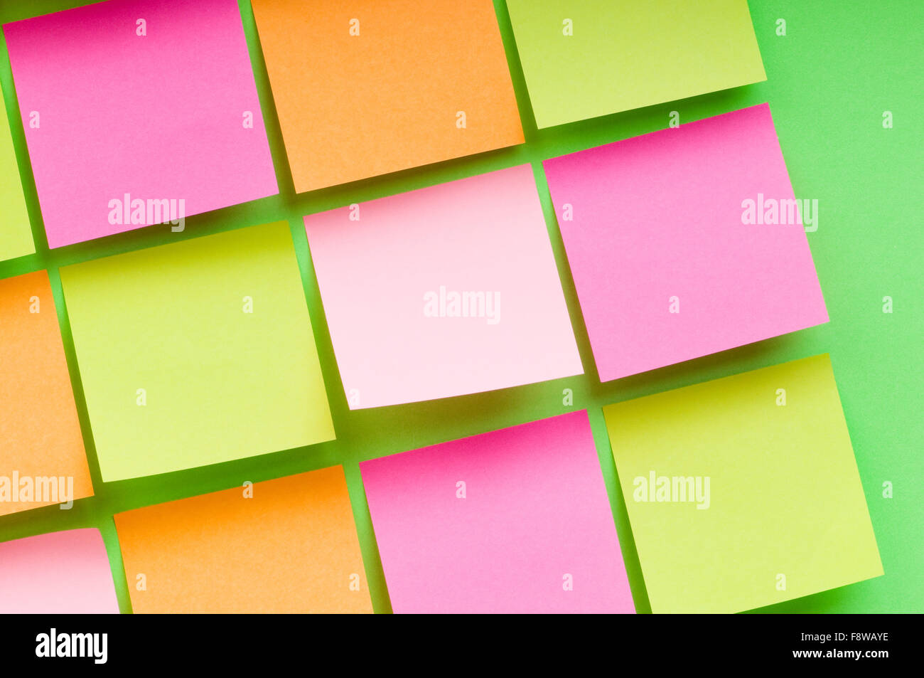 Reminder notes on the bright colorful paper Stock Photo - Alamy