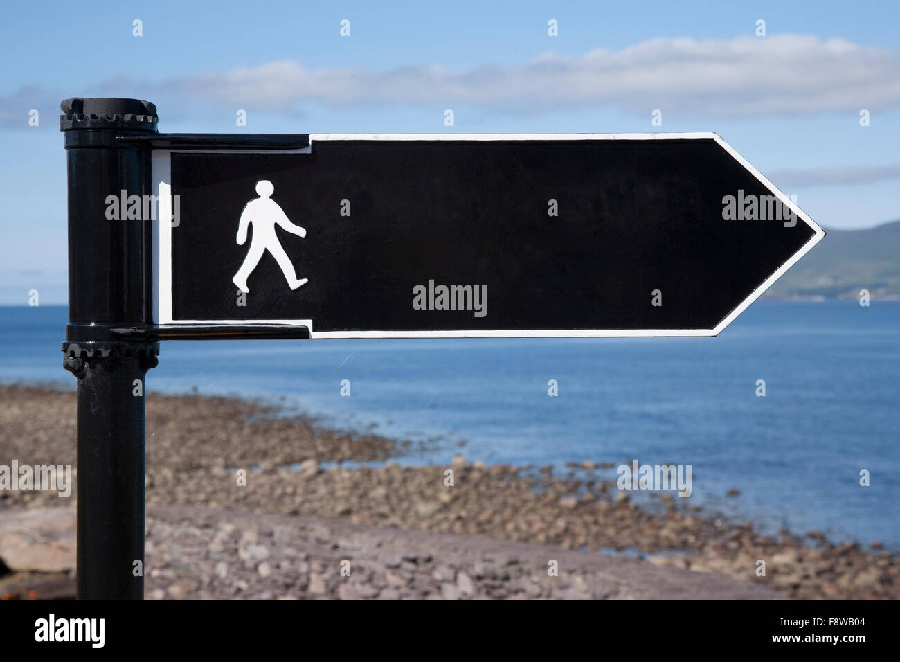 Walking Sign against Sea Background Stock Photo - Alamy