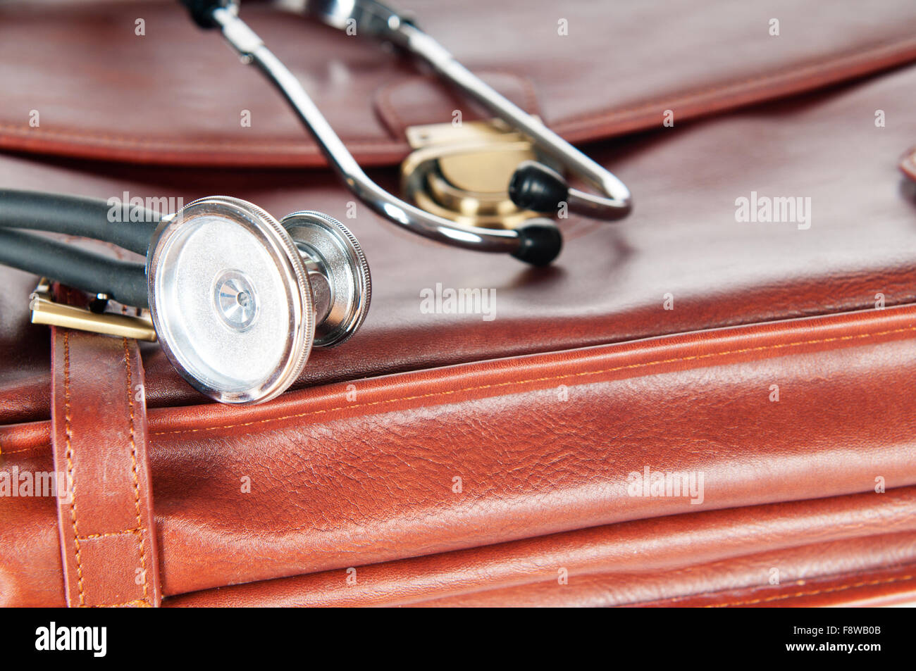 Doctor's brown leather case with the stethoscope Stock Photo - Alamy