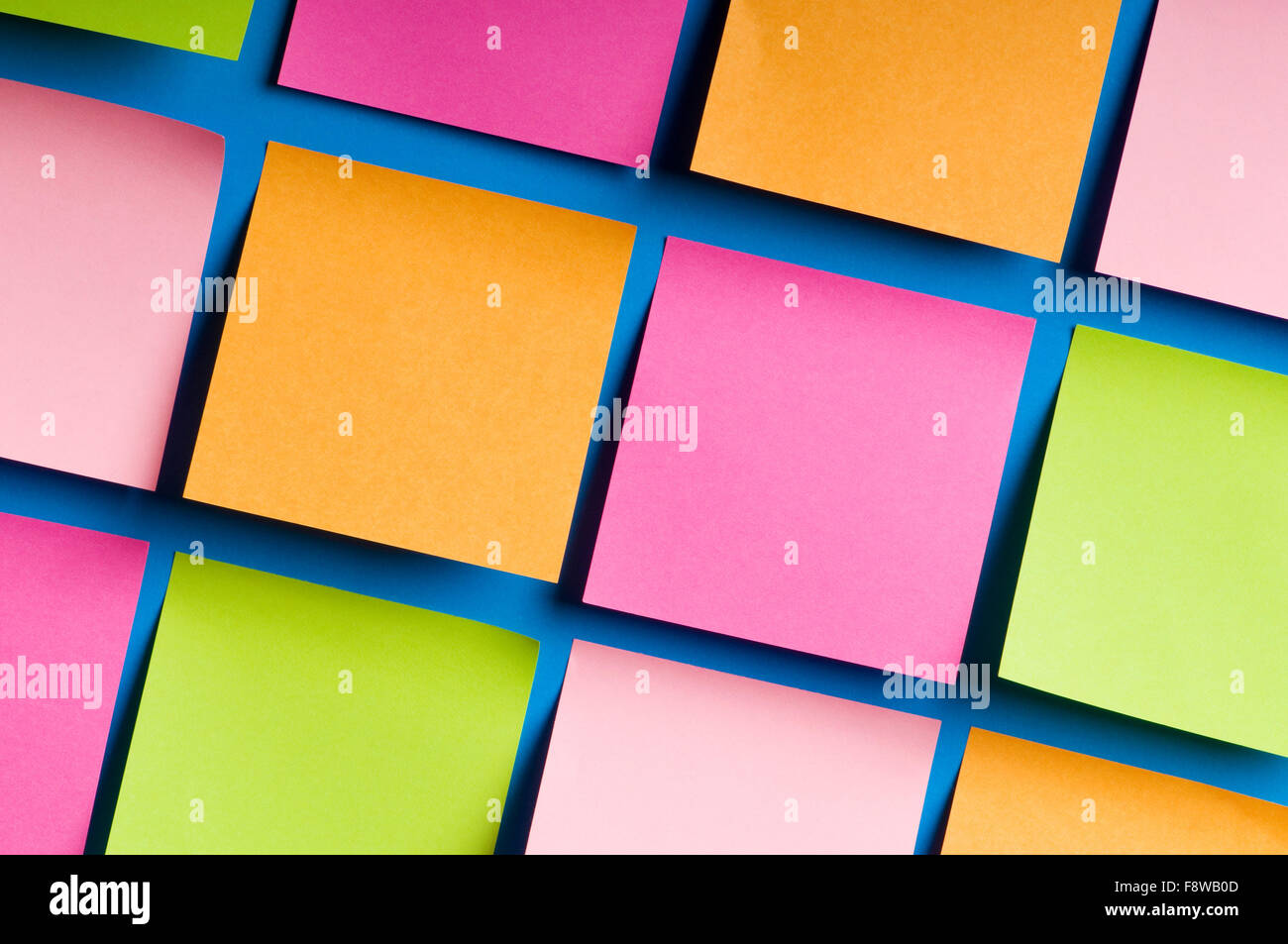Reminder notes on the bright colorful paper Stock Photo - Alamy