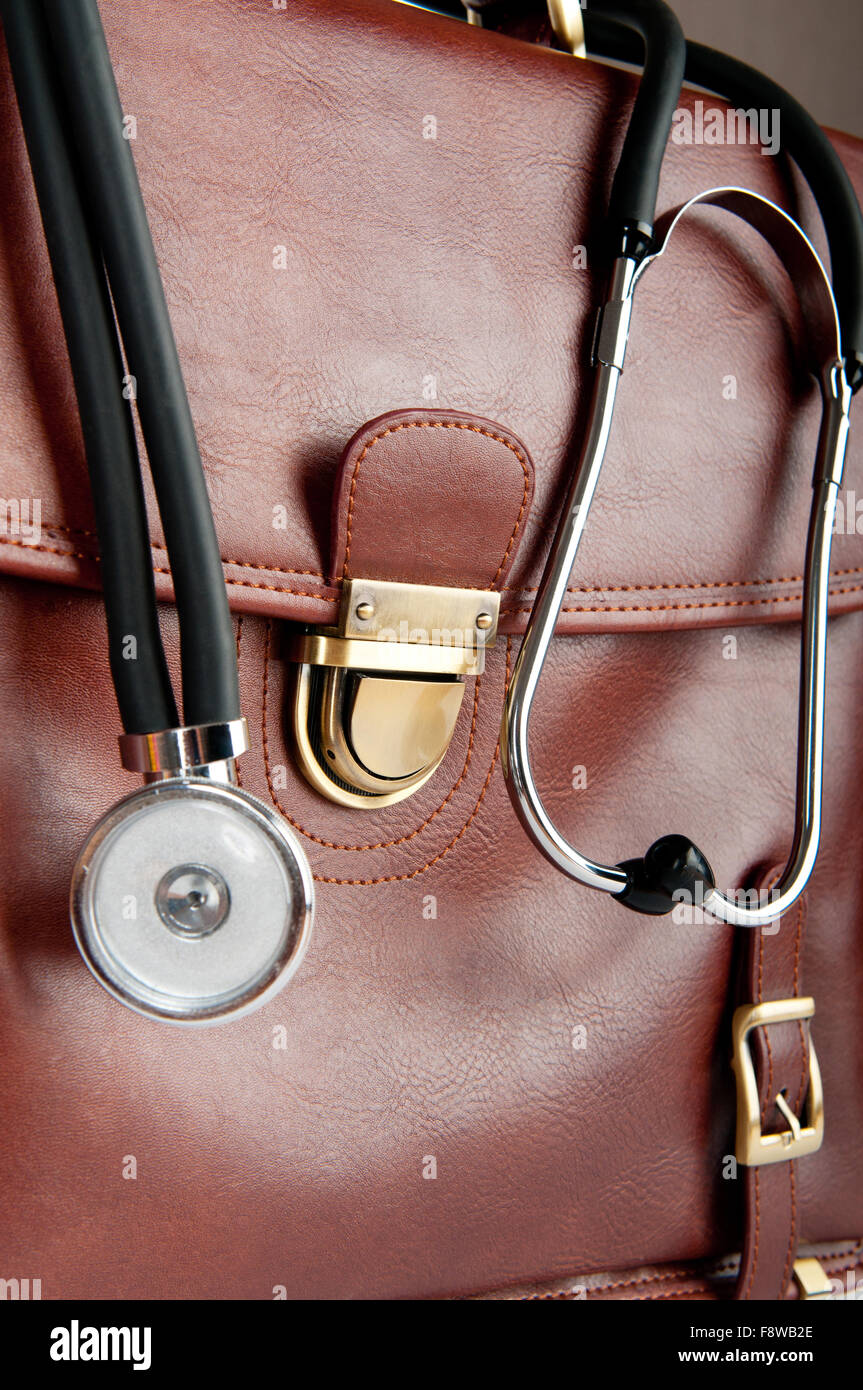 Leather briefcase and stethoscope hi-res stock photography and images ...
