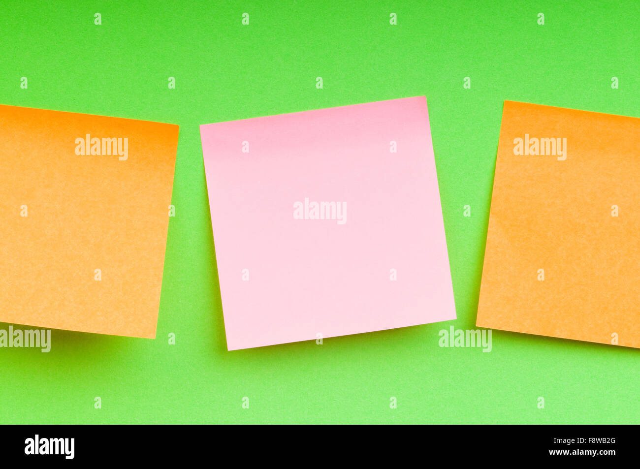 Reminder notes on the bright colorful paper Stock Photo - Alamy