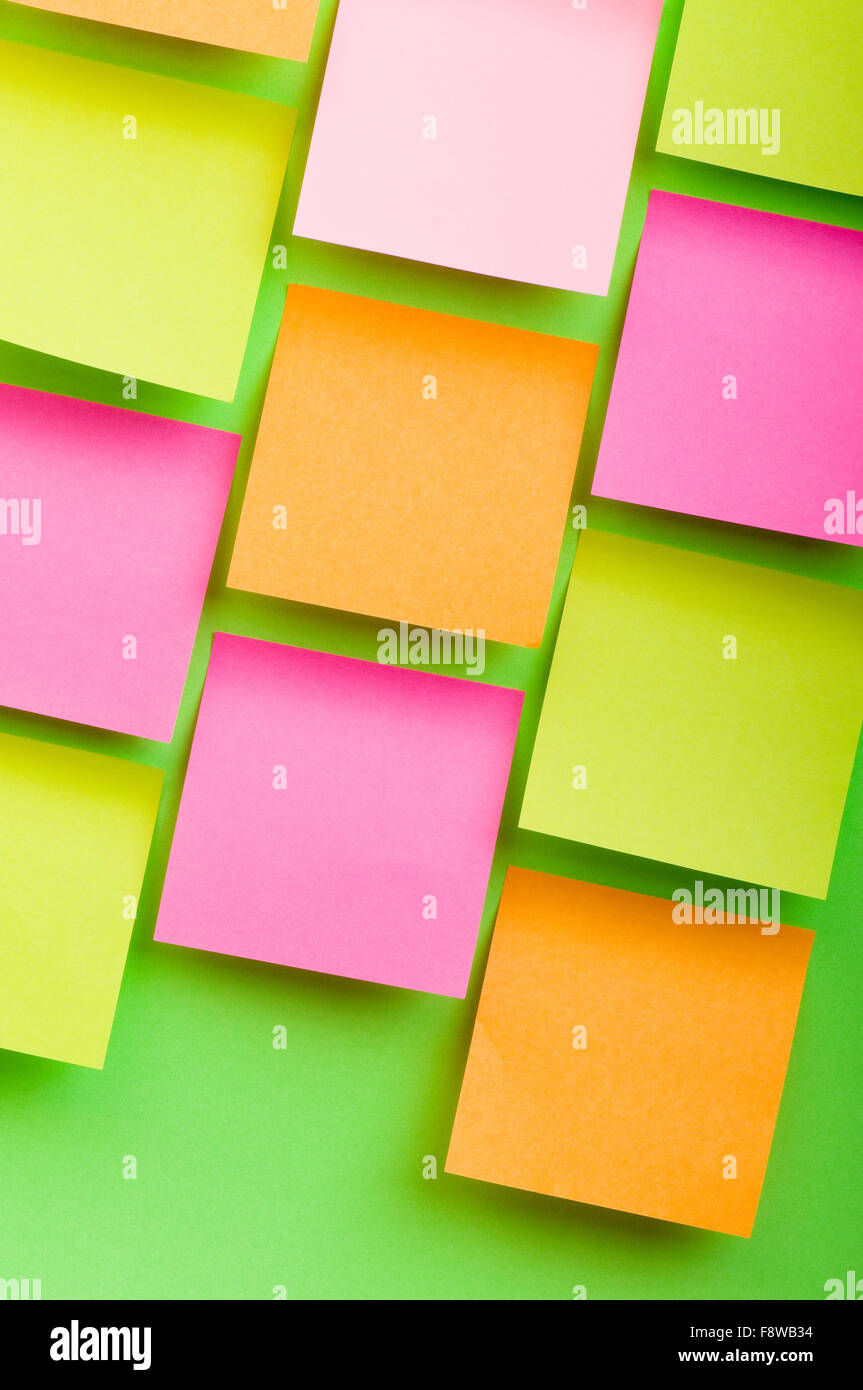 Reminder notes on the bright colorful paper Stock Photo - Alamy