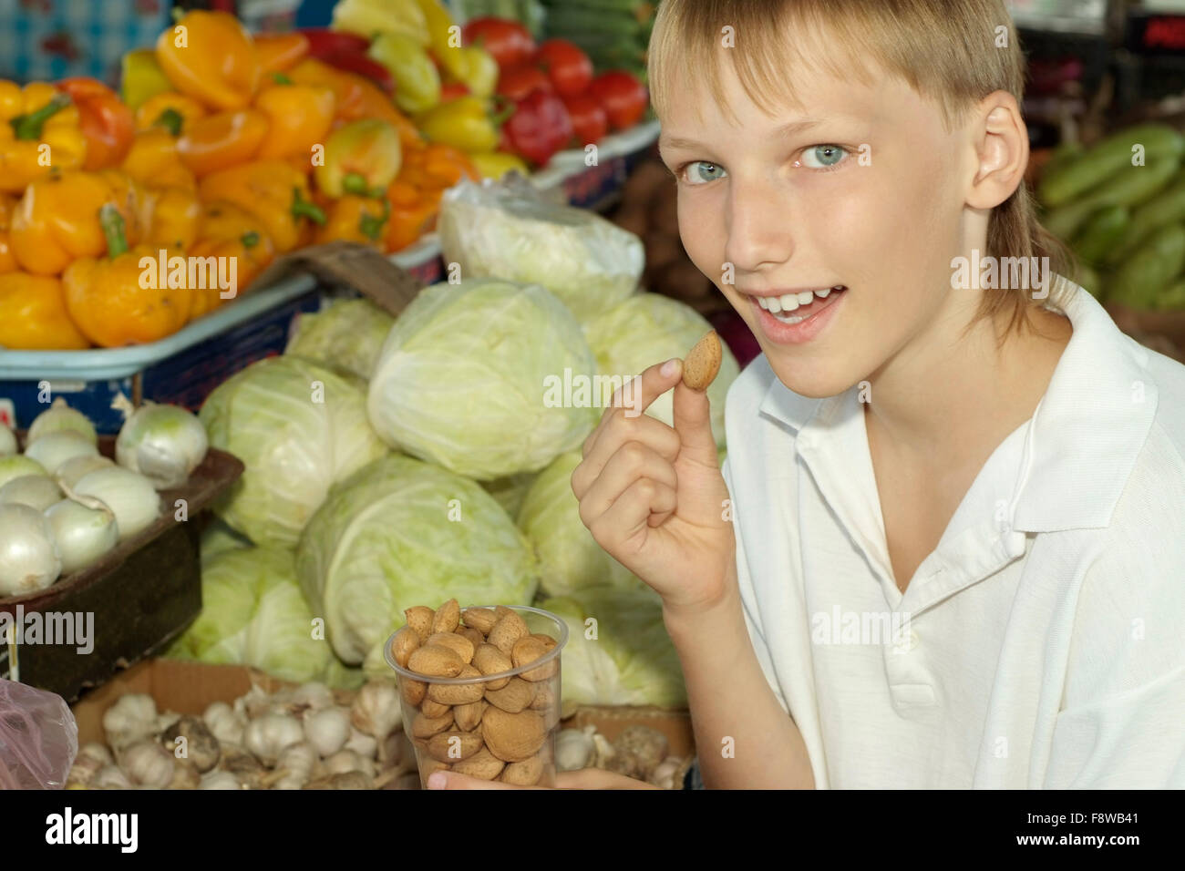 Young boy on market Stock Photo - Alamy