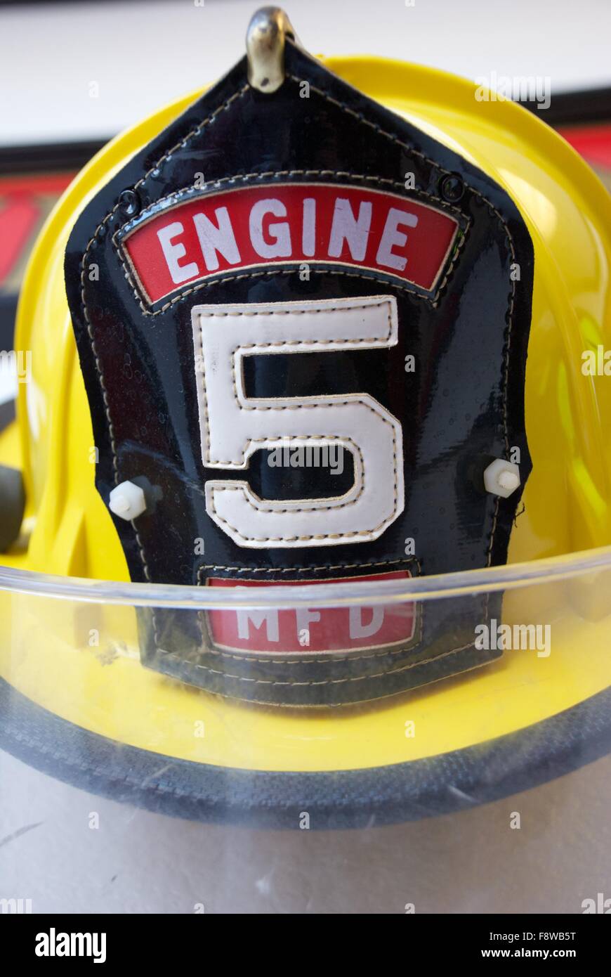 Yellow Fireman's Hat Stock Photo - Alamy