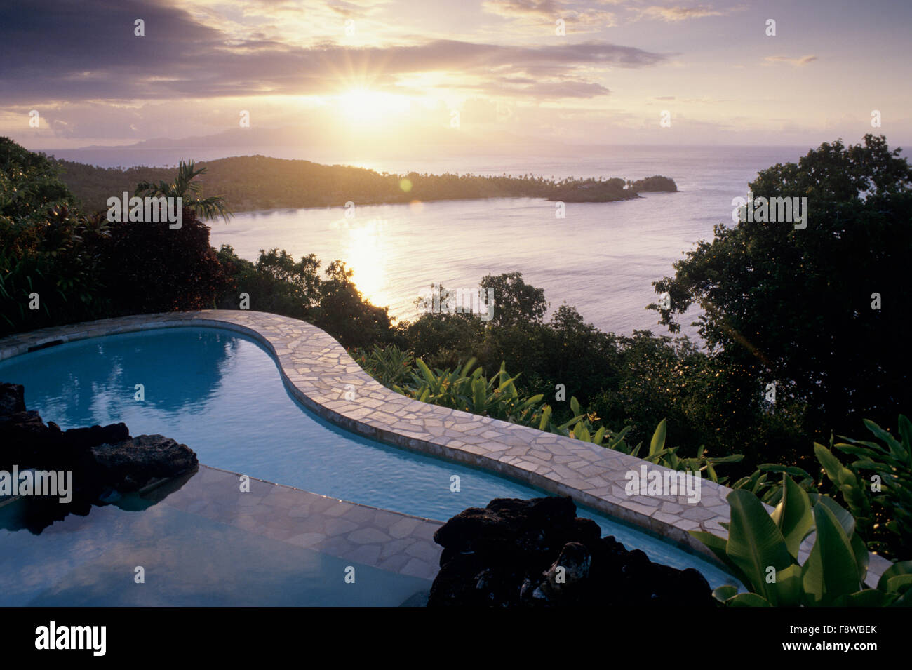 Fiji Islands, Wakaya Club, Vale O, sunset view of pool and ocean ...