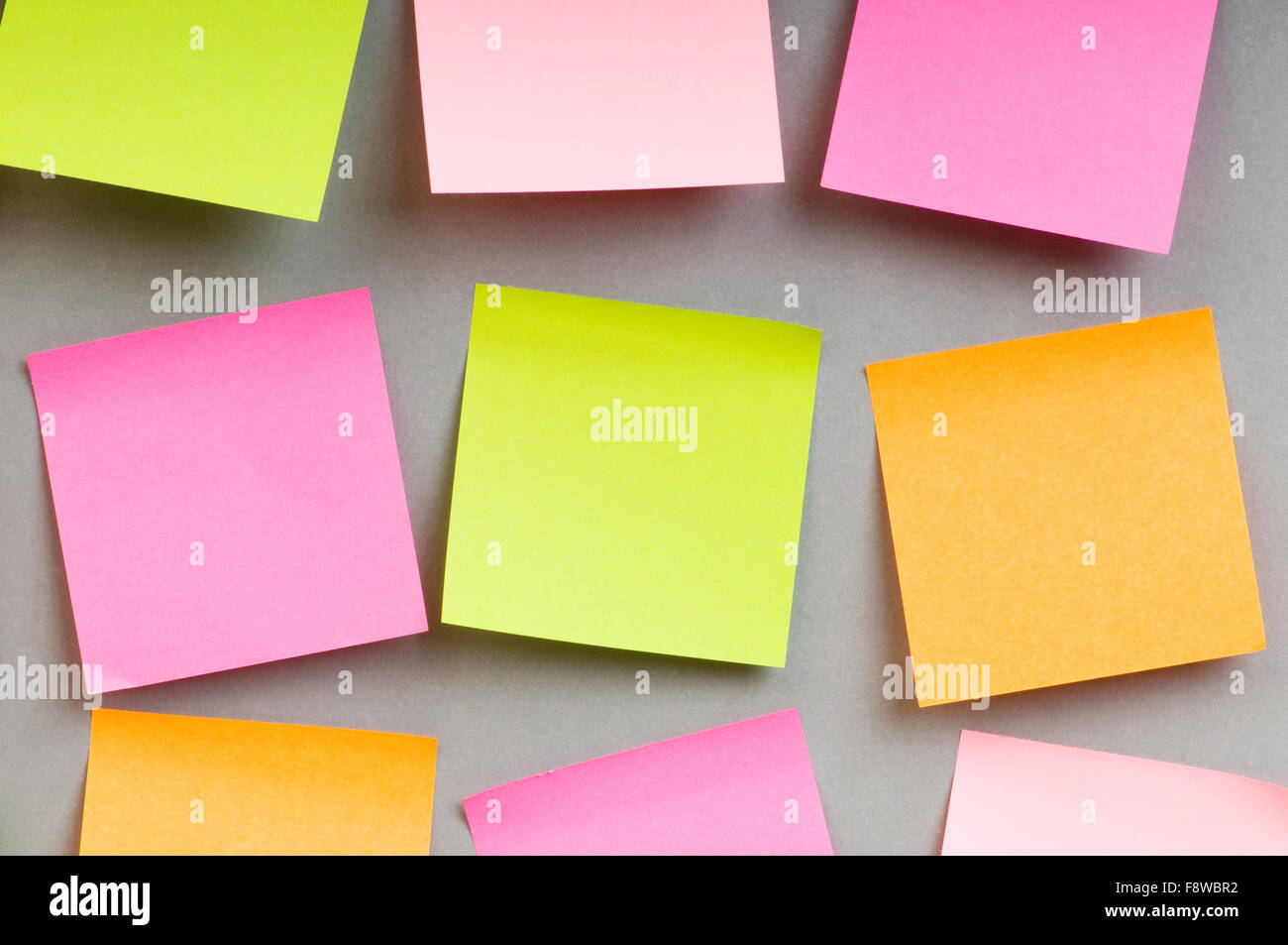 Reminder notes on the bright colorful paper Stock Photo - Alamy