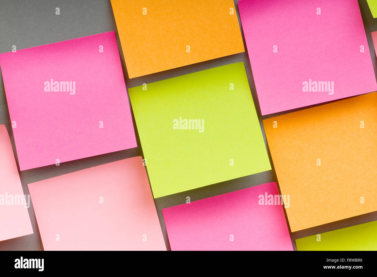 Reminder notes on the bright colorful paper Stock Photo - Alamy