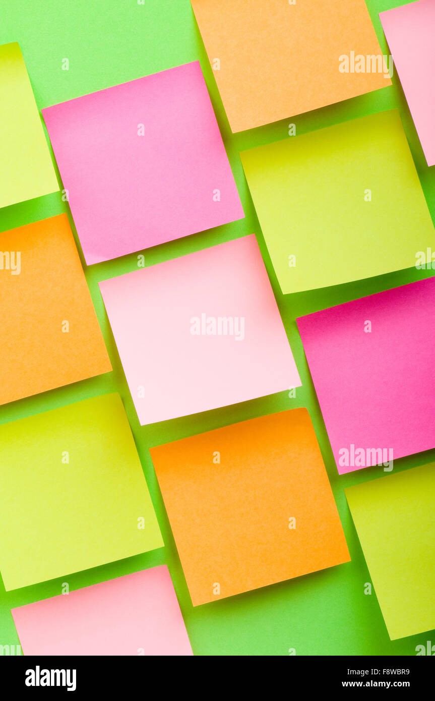 Reminder notes on the bright colorful paper Stock Photo - Alamy