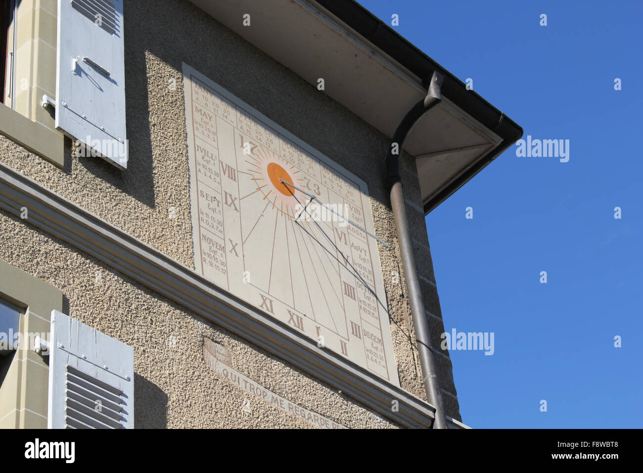 Solar clock on a wall Stock Photo - Alamy
