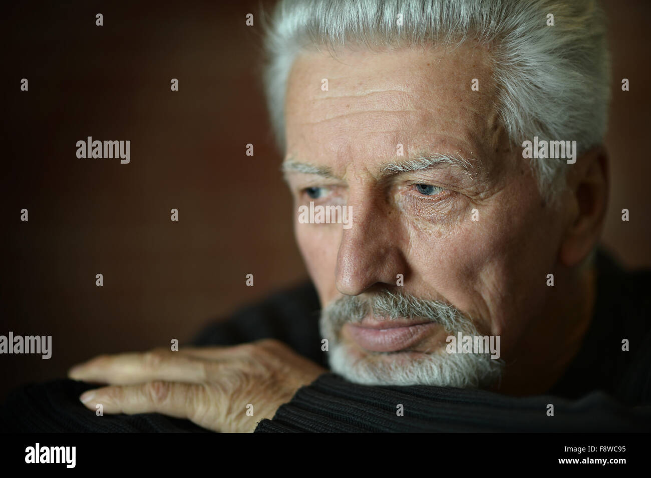 Sad senior man at home Stock Photo - Alamy