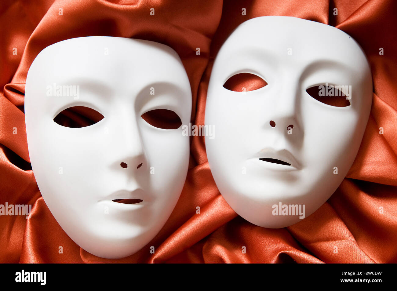 Theatre concept with the white plastic masks Stock Photo - Alamy