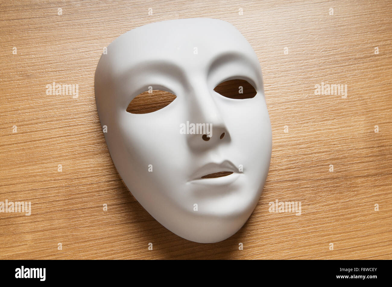 Theatre concept with the white plastic masks Stock Photo - Alamy
