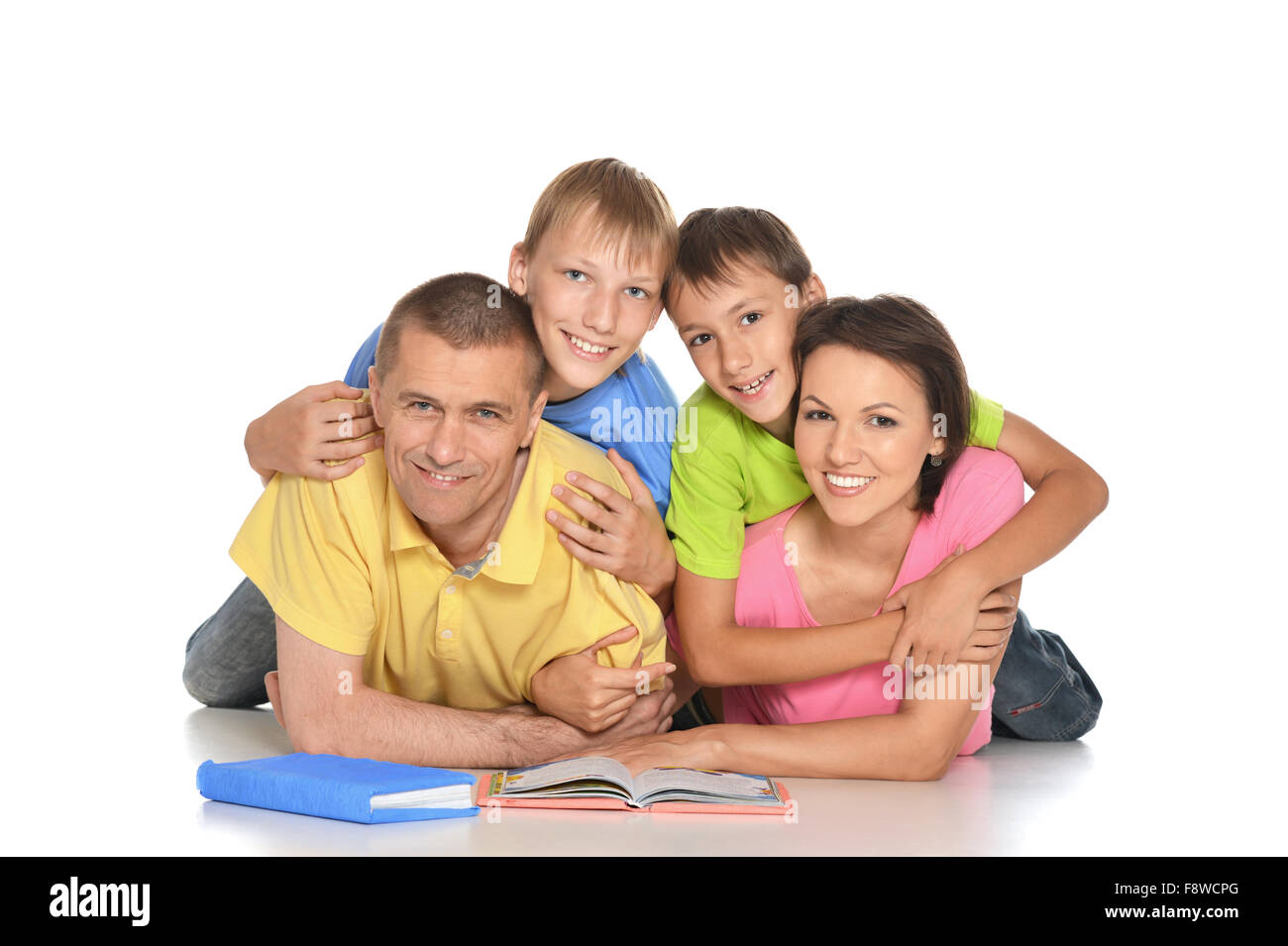 Parents helping children with homework Stock Photo - Alamy