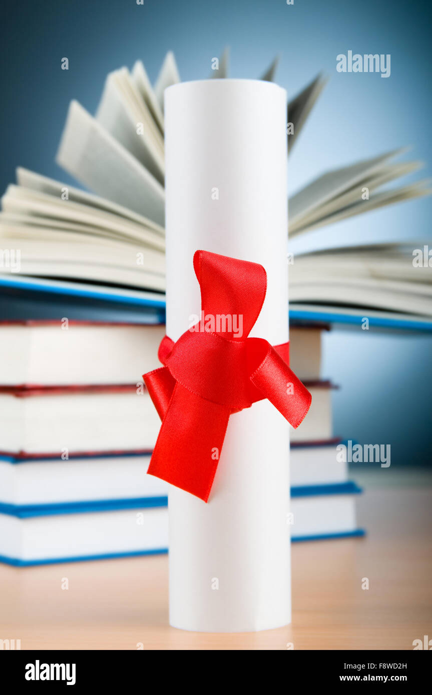 Diploma and stack of books against the background Stock Photo - Alamy