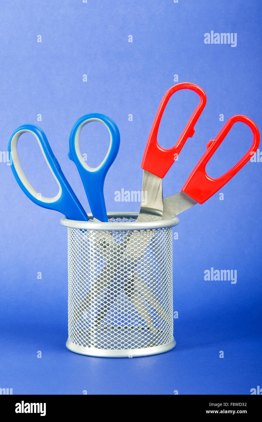 Colorful scissors on the color paper background Stock Photo - Alamy